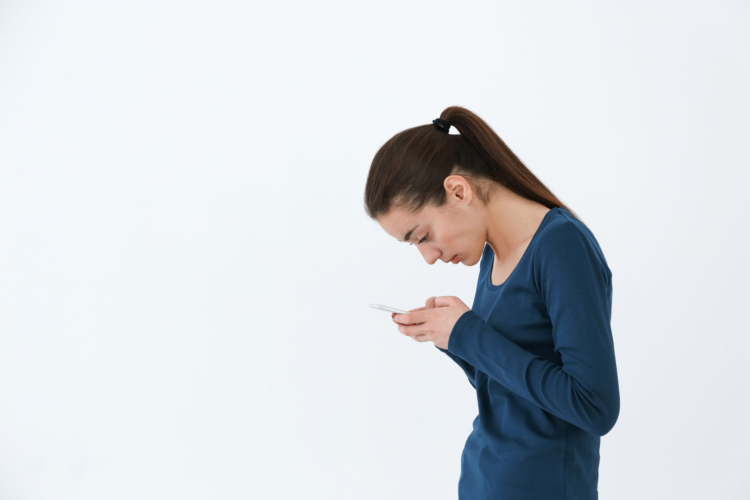 Text Neck: Impact of Looking Down at Our Phones - Alter Chiropractic